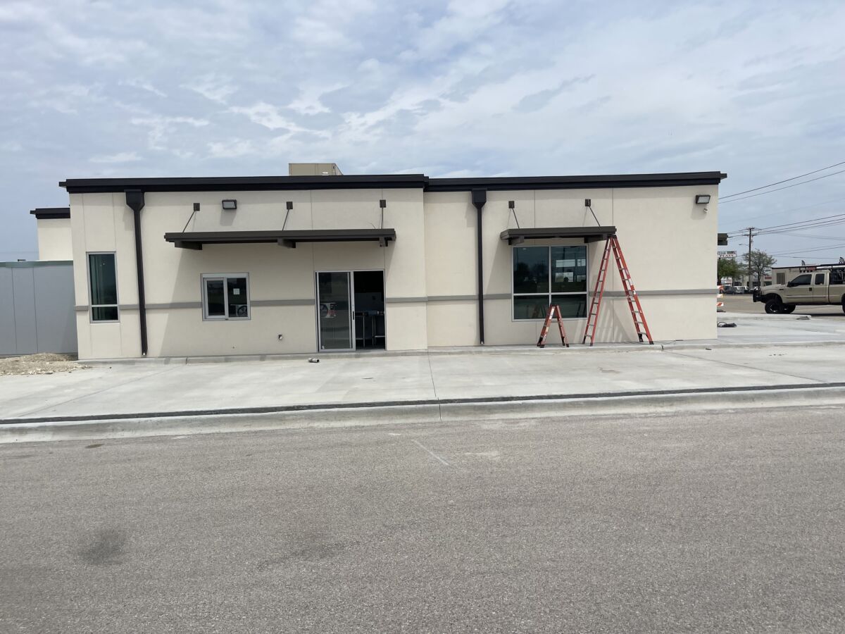 Custom aluminum canopies with hanger rods and fascia trim - Austin ...