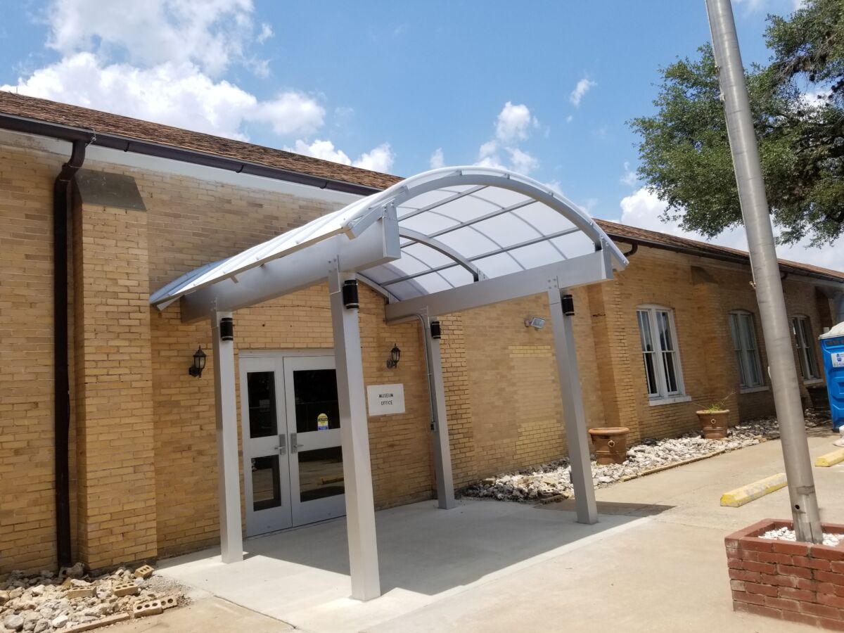 Translucent arched entryway structure - Austin American Awning