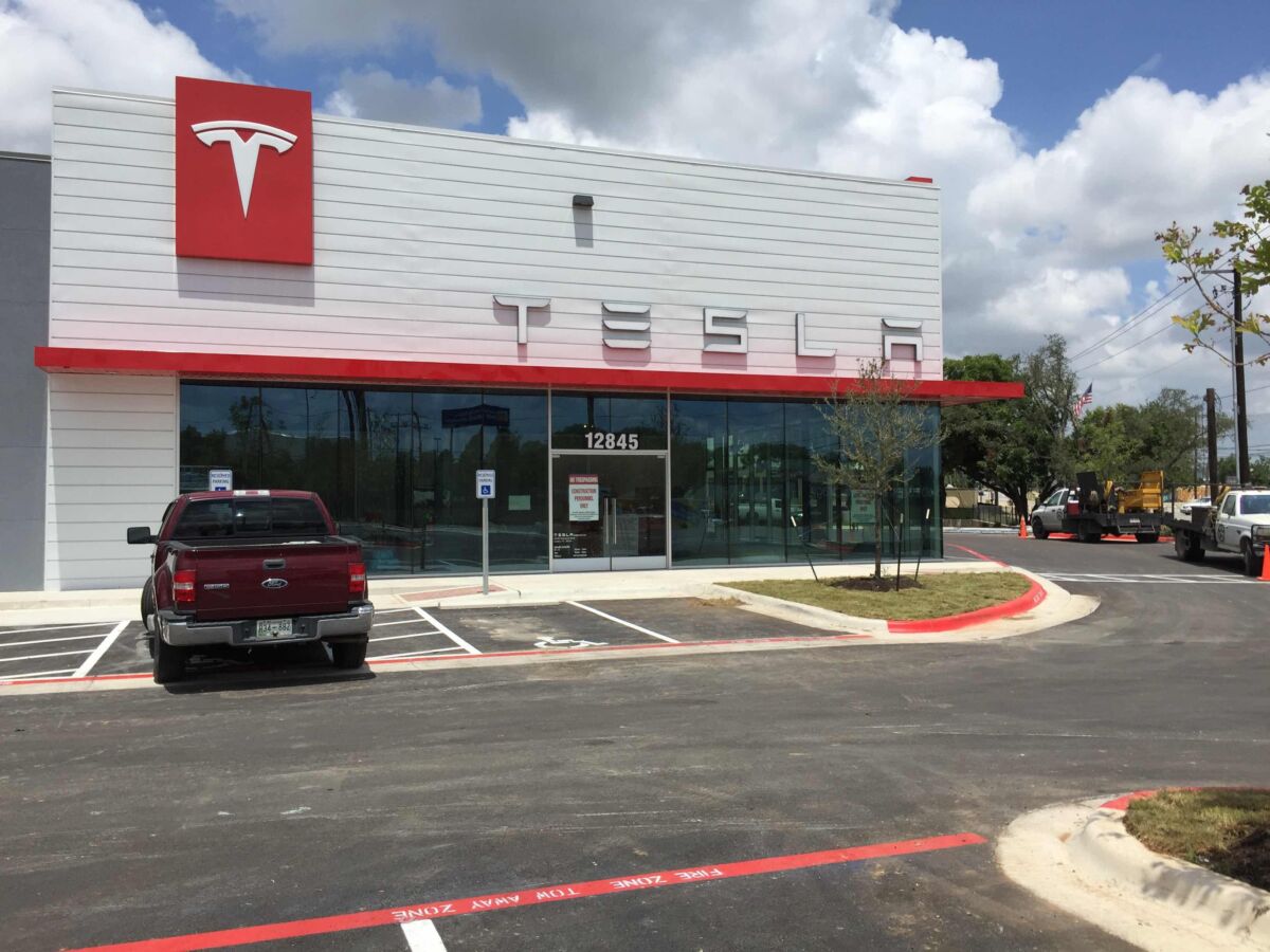 Custom cantilevered brow canopies - Tesla ATX - Austin American Awning