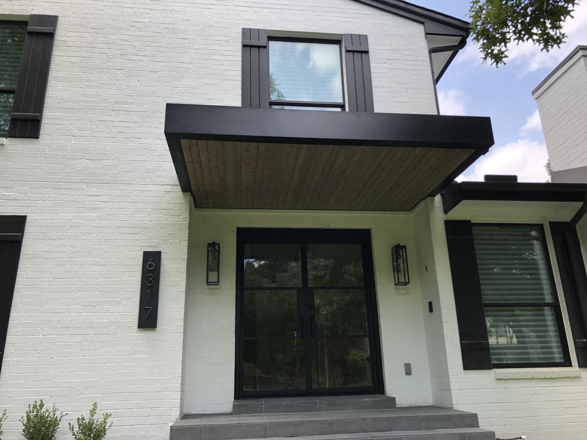 Custom aluminum canopy with hanger rods and flush wood soffit - Austin ...