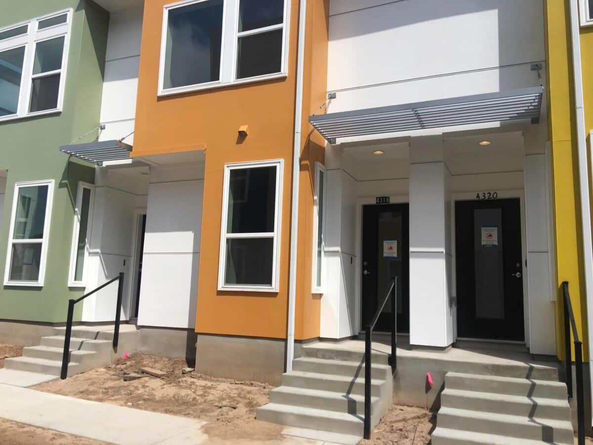 Aluminum sun control devices on modern build - Austin American Awning